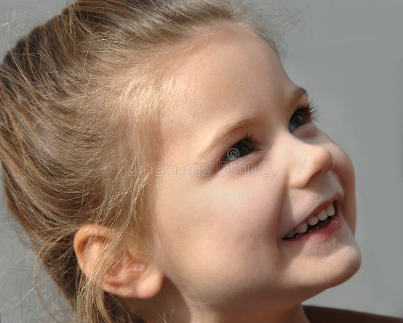 Beaming Young Girl stock photo. Image of pretty, happy - 23113708