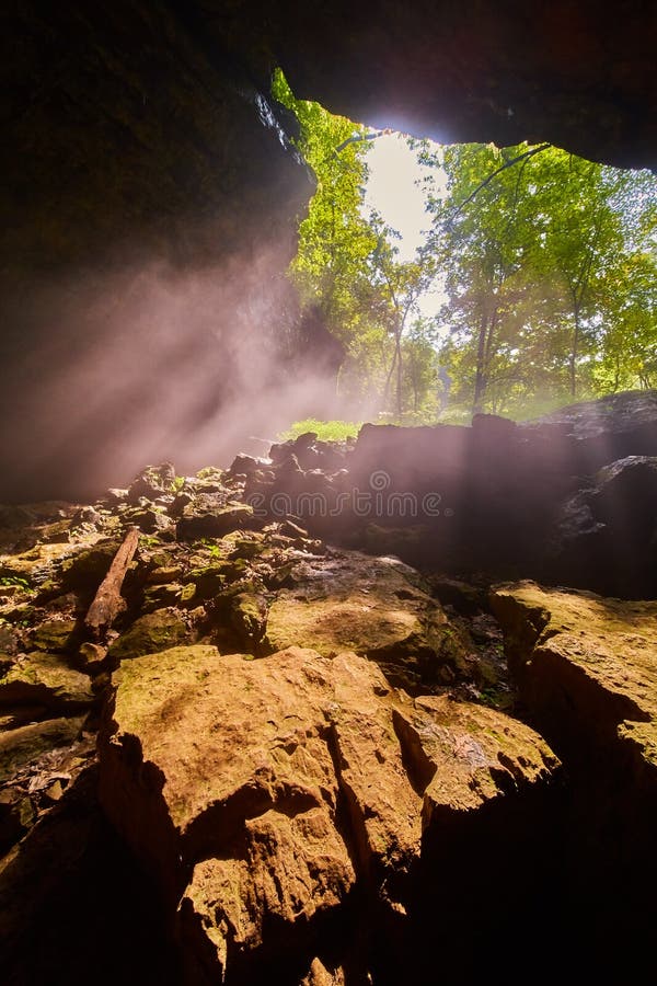 Beams of Light Shining into Cave Opening Stock Photo - Image of stone ...