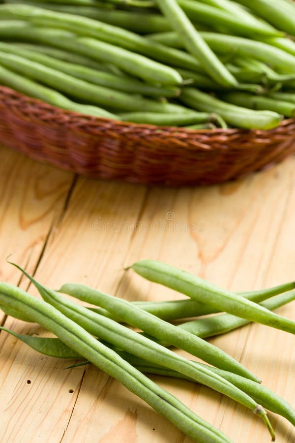 Bean pods on wooden table stock image. Image of nutritious - 17361149