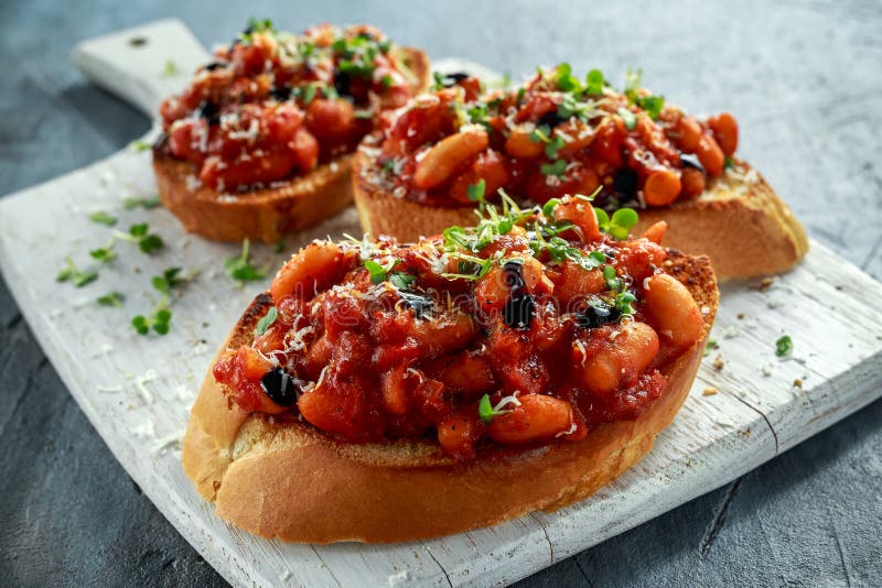 Beans Fried in Tomato Sauce on Toasted Bread with Cross Salad Sprinkle ...
