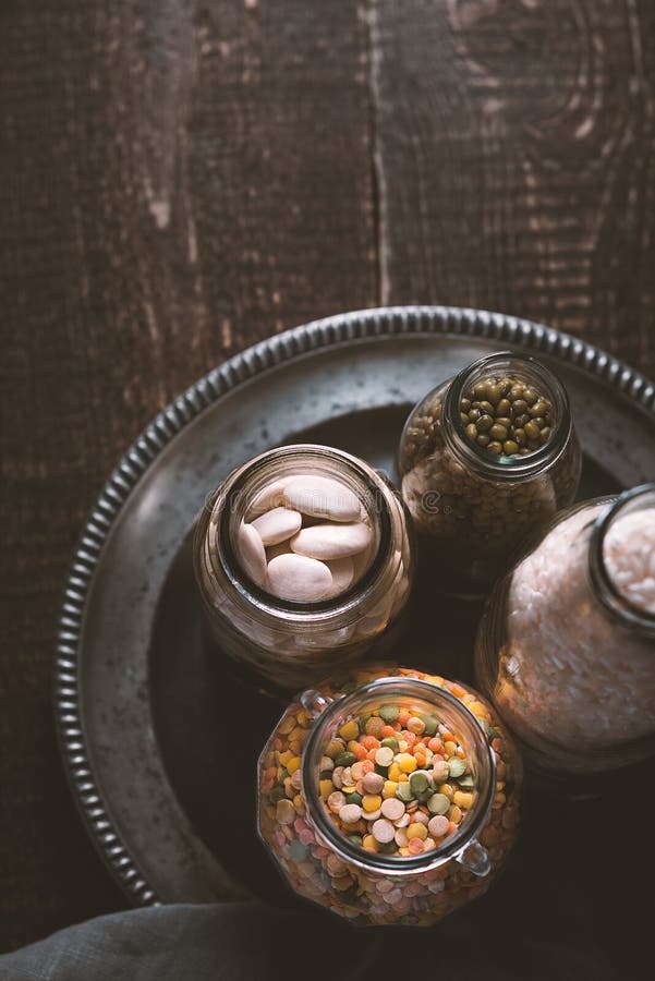Beans, Lentils, Rice, Bottled on a Tin Plate Stock Image - Image of ...