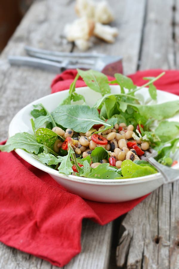 Beans and ruccola salad stock image. Image of eating - 32125205