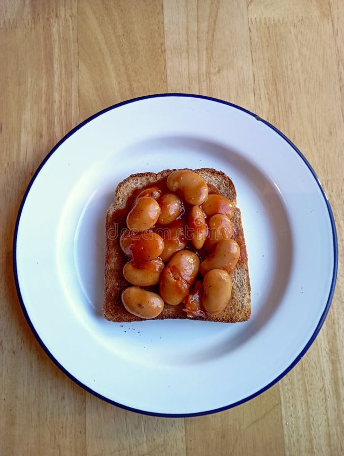 Beans on Toast stock image. Image of wood, crockery - 245395753