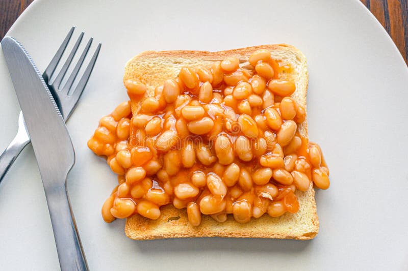 Beans on Toast with Fork and Knife. Stock Image - Image of plate ...
