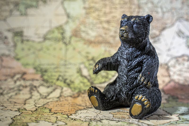 Bear cub on a map stock image. Image of slow, investment - 209032527