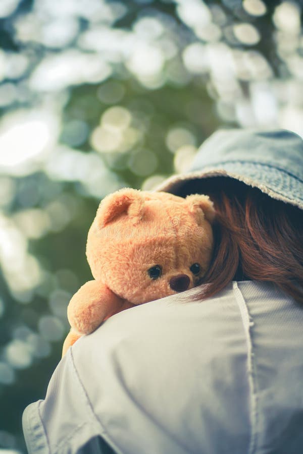 The Bear Doll Hug by Human in the Nature Stock Image - Image of swing ...