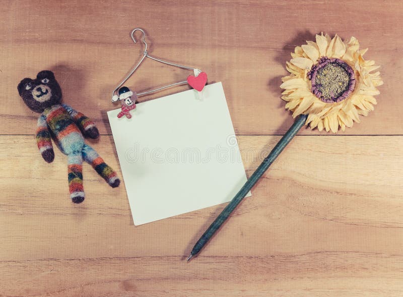 A Bear and a Pen To Take Notes on the Wooden Floor. Stock Photo - Image ...