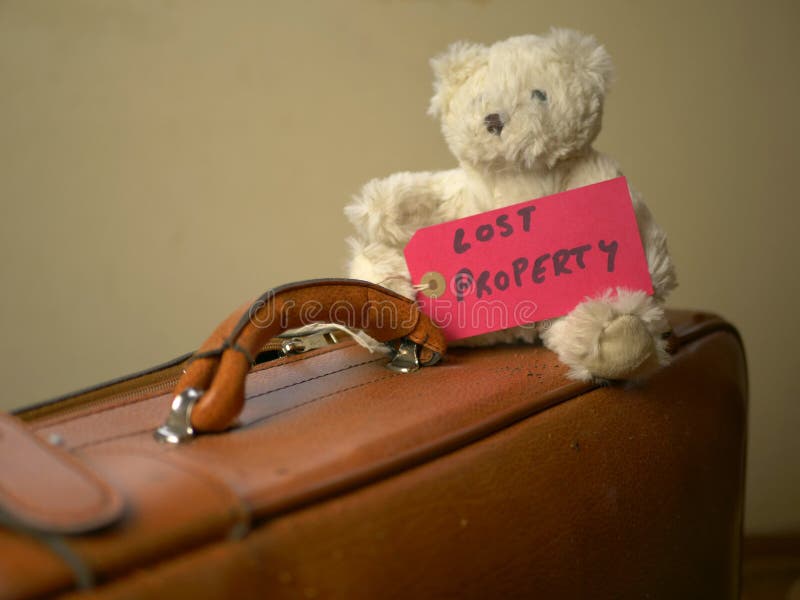 Bear Toy on an Old Suitcase with a Lost Property` Label Tag` Stock ...