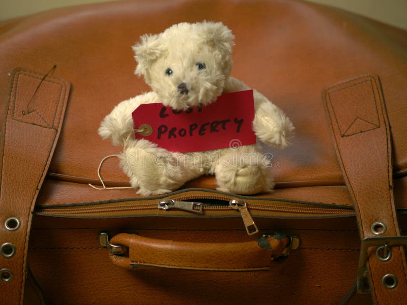 Bear Toy on an Old Suitcase with a Lost Property` Label Tag` Stock ...