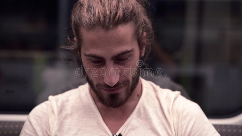 Beard Handsome Guy Smiles Sitting in an Underground Car Stock Footage ...