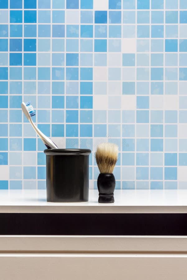 A Beard Soap Brush and a Container with a Toothbrush on a White ...