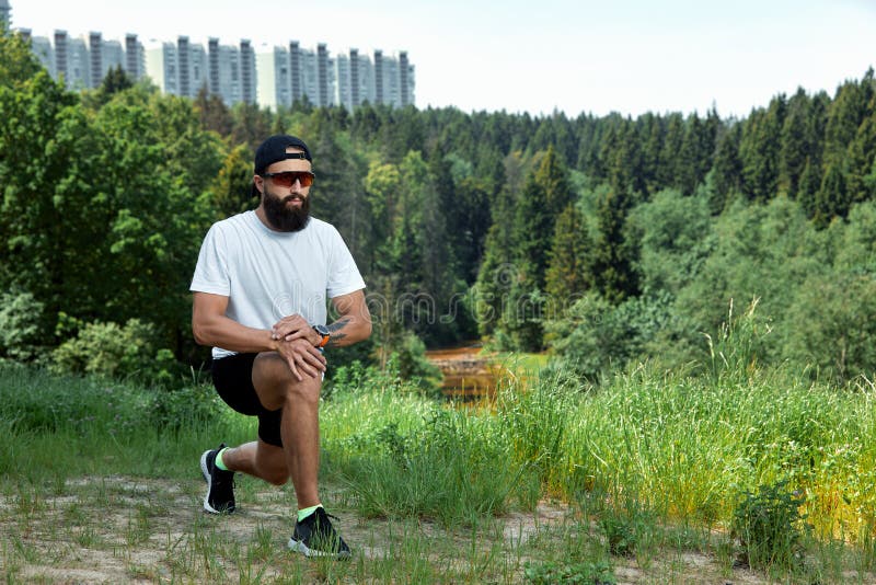 Bearded Athletic Man Doing Workout Exercise in the Outdoor Gym in ...