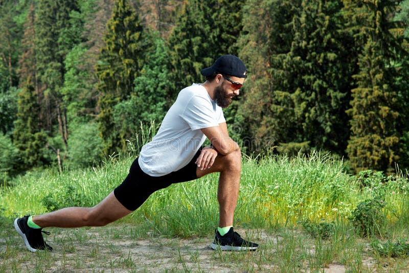 Bearded Athletic Man Doing Workout Exercise in the Outdoor Gym in ...