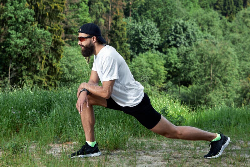 Bearded Athletic Man Doing Workout Exercise in the Outdoor Gym in ...