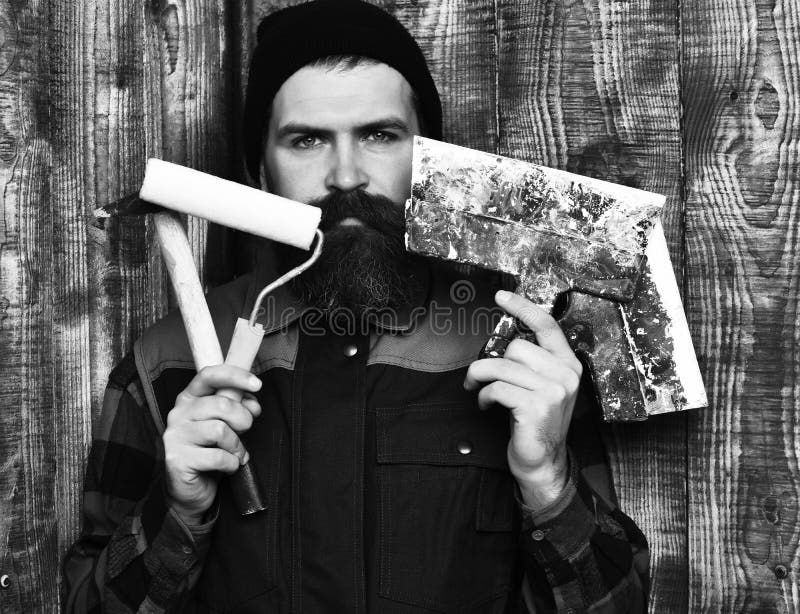 Bearded Builder Man Holding Various Building Tools with Serious Face ...