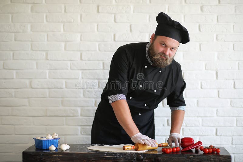 Bearded Chef Chef Prepares Meals Stock Photo - Image of dinner, knife ...