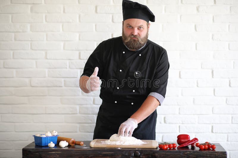 Bearded Chef Chef Prepares Meals Stock Photo - Image of knife, meal ...