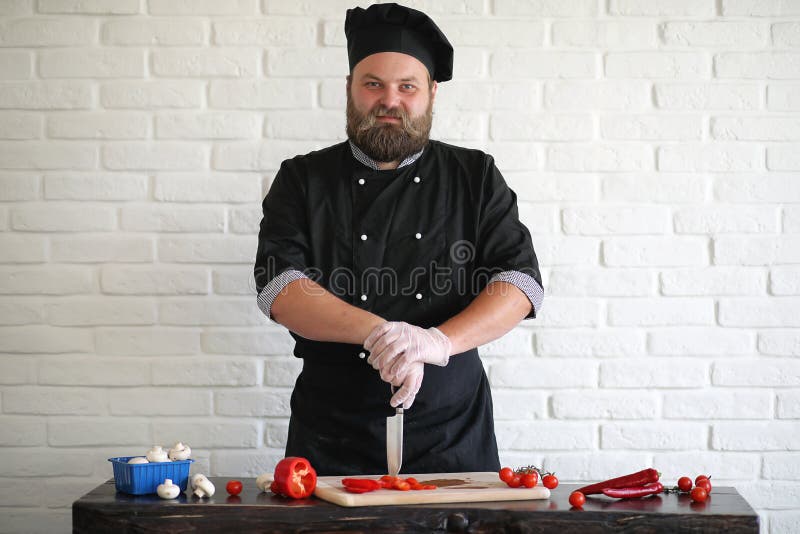 Bearded Chef Chef Prepares Meals Stock Photo - Image of positive, meal ...