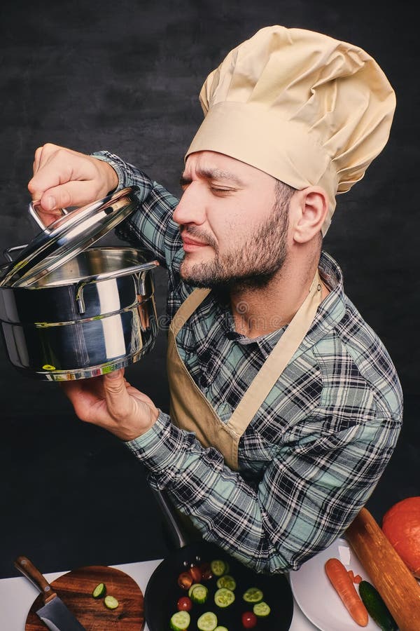 Bearded Chef Cook Tasting the Soup from a Pan. Stock Image - Image of ...