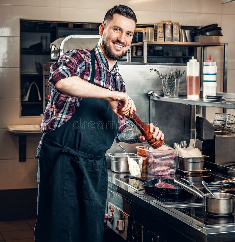 Chef Cooking Beef Steak on a Kitchen. Stock Image - Image of grilled ...