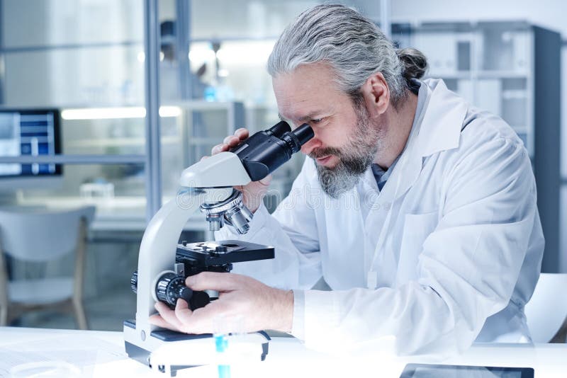 Chemist Using Microscope for Researching at Lab Stock Image - Image of ...