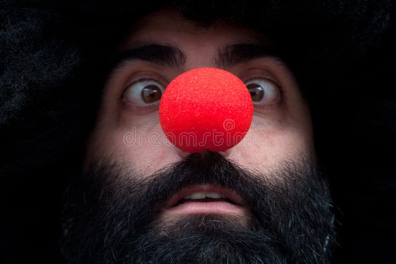 Caucasian Man with Crazy Look Wearing a Clown Nose Stock Photo - Image ...
