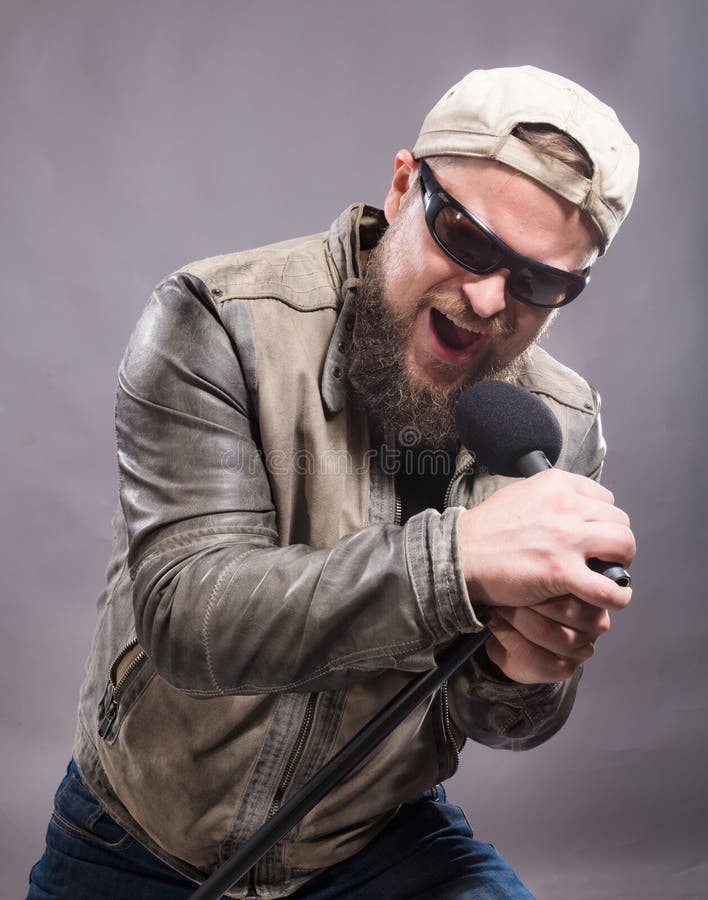 Bearded Emotional Rock Singer with Micriphone Studio Portrait. Stock ...