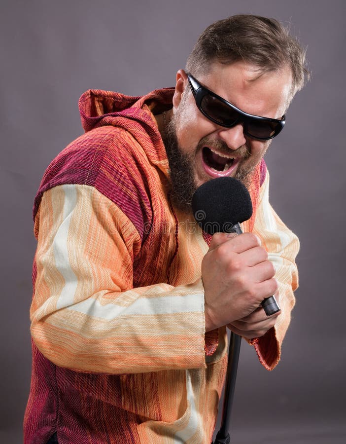 Bearded Emotional Rock Singer with Micriphone Studio Portrait. Stock ...