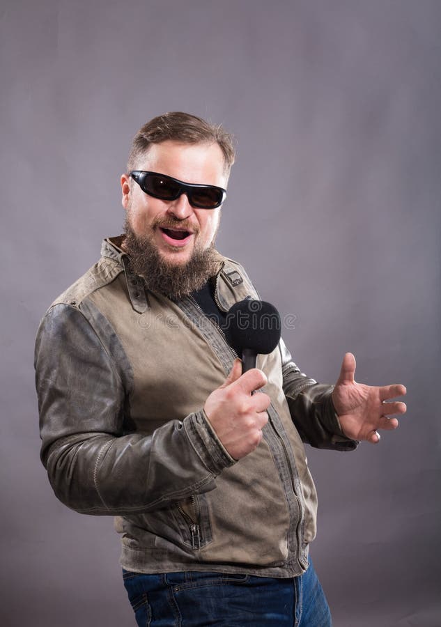 Bearded Emotional Rock Singer with Microphone Studio Portrait, Stock ...