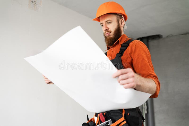 Bearded Engineer Builder with Blueprints. Architect at Construction ...