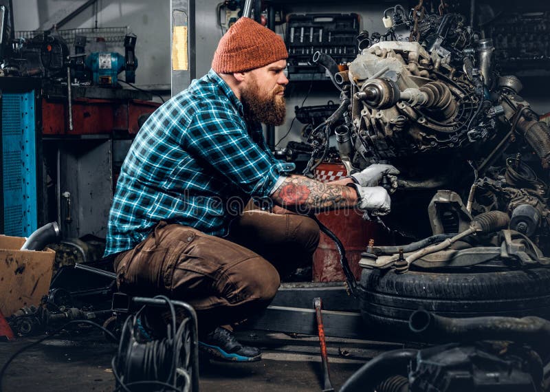 Fat Car Mechanic Stock Photos - Free & Royalty-Free Stock Photos from ...