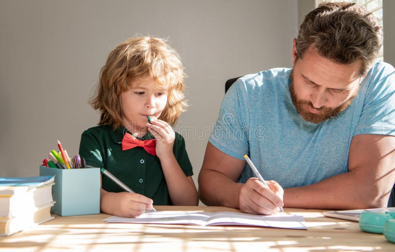 Bearded Father Writing School Homework with His Boy Son in Classroom ...