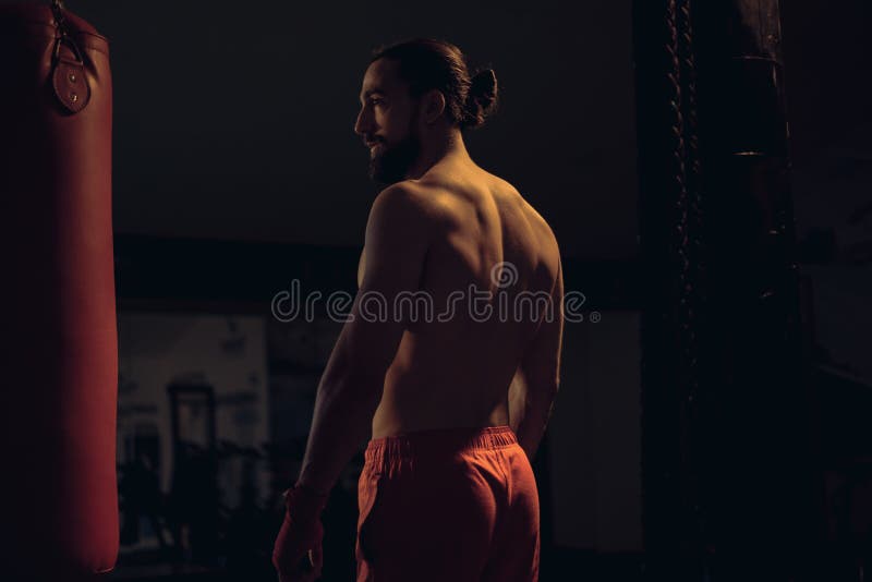 Bearded Fighter Looking at the Heavy Bag Stock Image - Image of boxer ...
