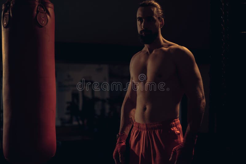 Bearded Fighter Standing by the Heavy Bag Stock Photo - Image of ...
