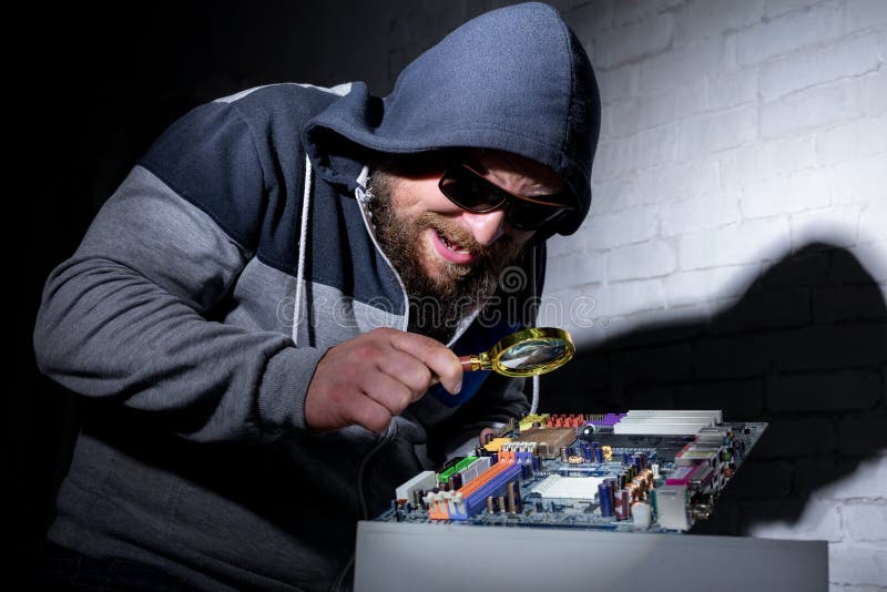 Bearded Hacker in Sunglasses and Hoodie Cracking the Hardware Stock ...