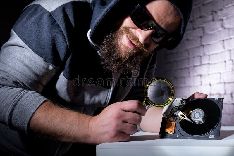 Bearded Hacker in Sunglasses and Hoodie Cracking the Hardware Stock ...