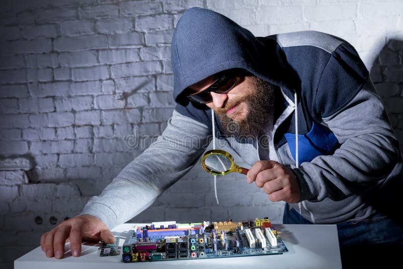 Bearded Hacker in Sunglasses and Hoodie Cracking the Hardware Stock ...