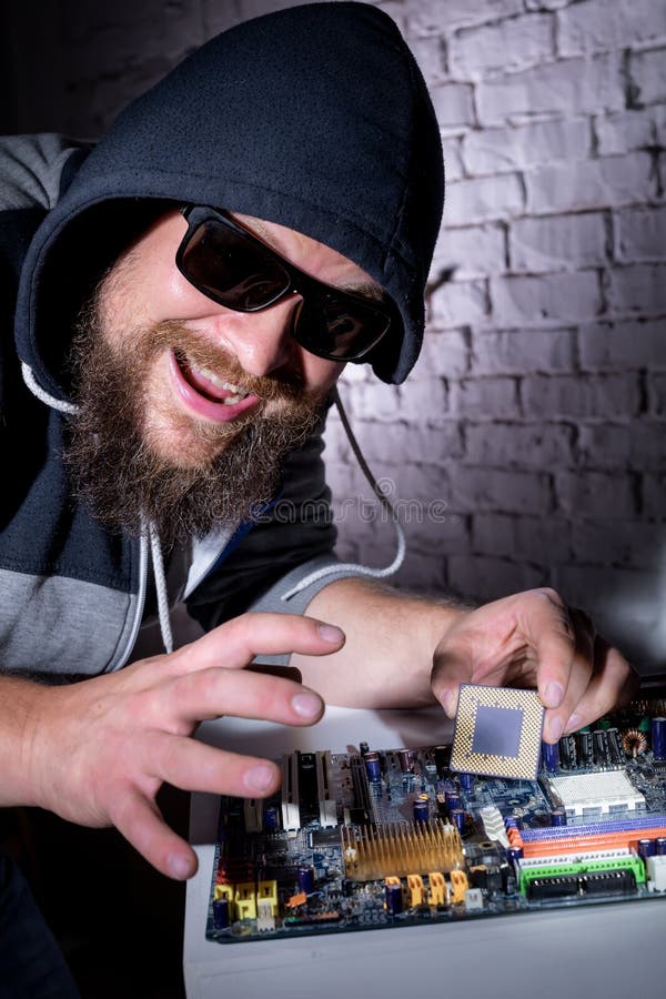 Bearded Hacker in Sunglasses and Hoodie Cracking the Hardware Stock ...