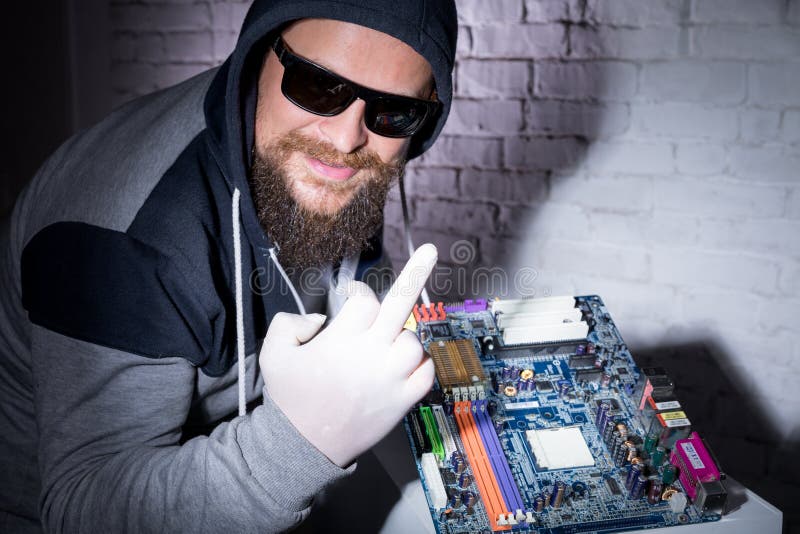 Bearded Hacker in Sunglasses and Hoodie Cracking the Hardware Stock ...