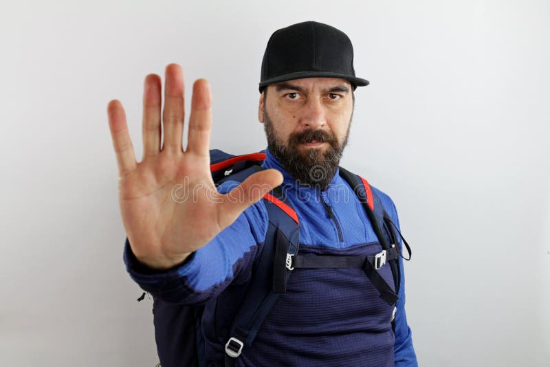 Bearded Hiker with Backpack and Hat, Doing Stop Sign with Palm of the ...