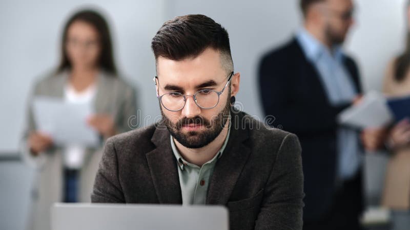 Bearded Hispanic Man Employee Manager Working Use Laptop At Office