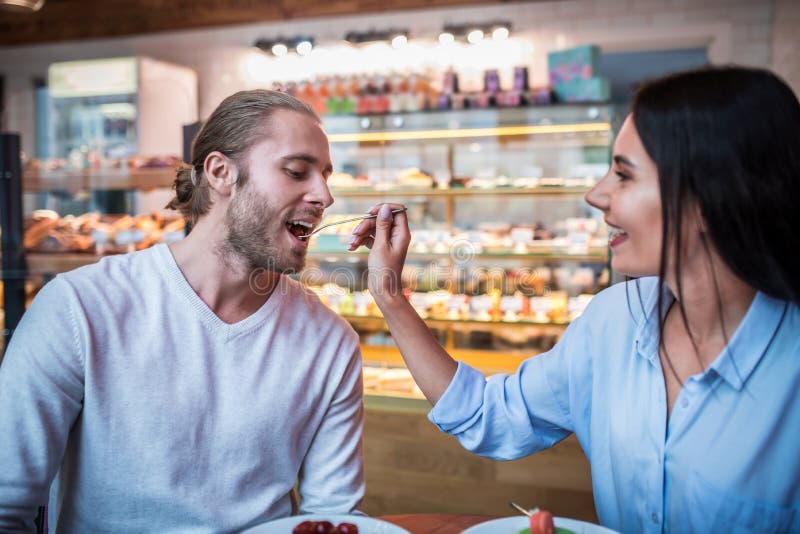 Bearded Husband Tasting Dessert while Spending Morning with Wife Stock ...