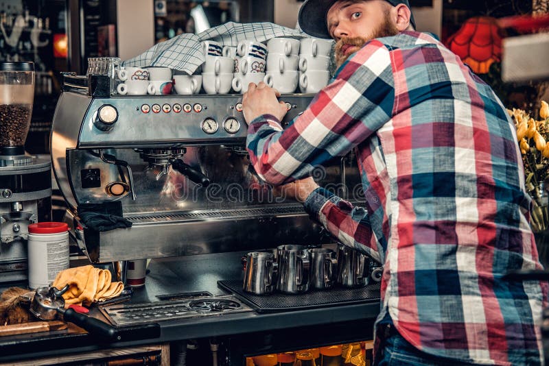 A Man is Making Coffee in a Professional Coffee Machine. Stock Photo ...
