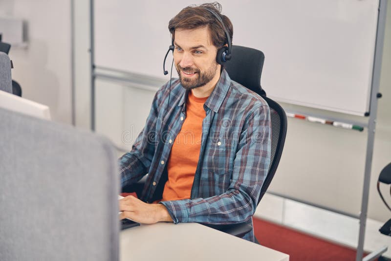 Cheerful Young Man Working in Modern Office Stock Image - Image of ...