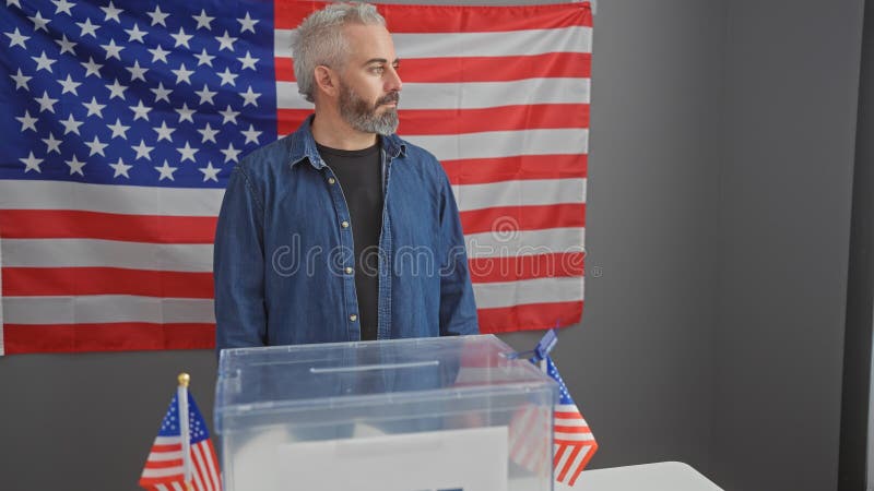 Bearded Man with American Flag Background at Polling Station during ...