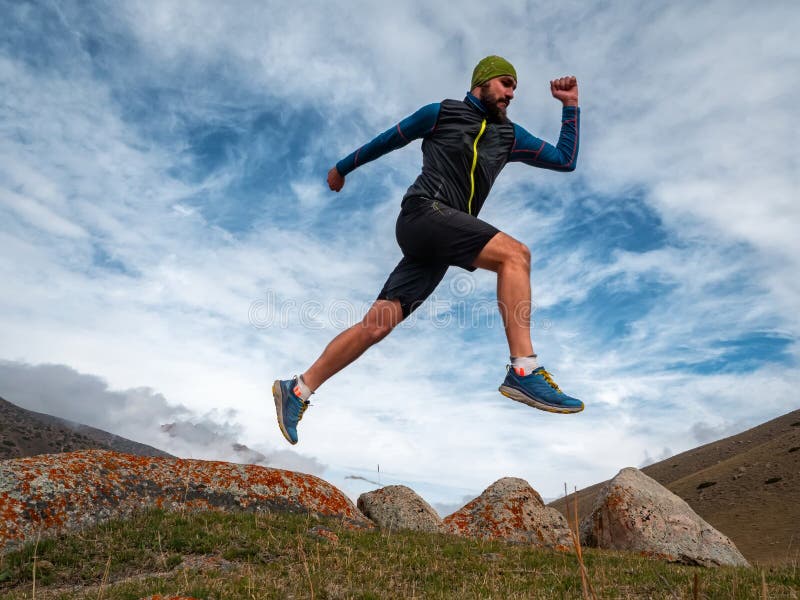 Bearded Man Athlete Jogging Outdoors in the Mountains Stock Photo ...