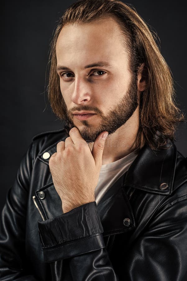 Bearded Man Biker in Leather Jacket with Long Hair, Beard Care Stock ...