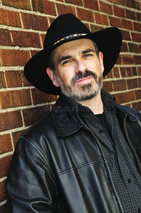 Bearded man in cowboy hat stock image. Image of grey - 10929443