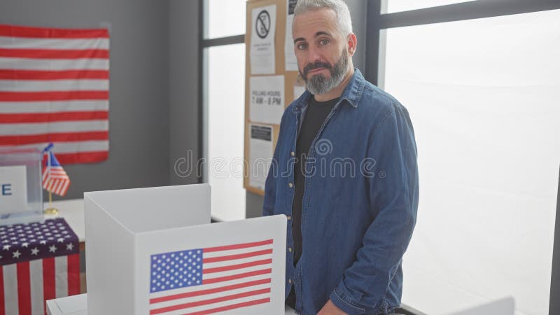 Bearded Man in Denim Voting at an American Electoral Center with Flag ...