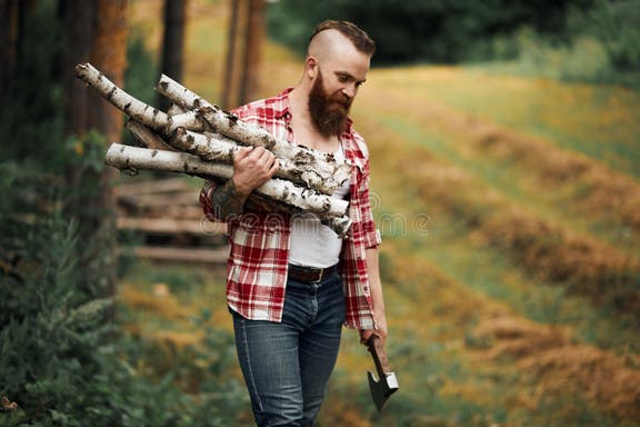 Bearded Man with Firewoods and with Axe on Shoulder Stock Photo - Image ...